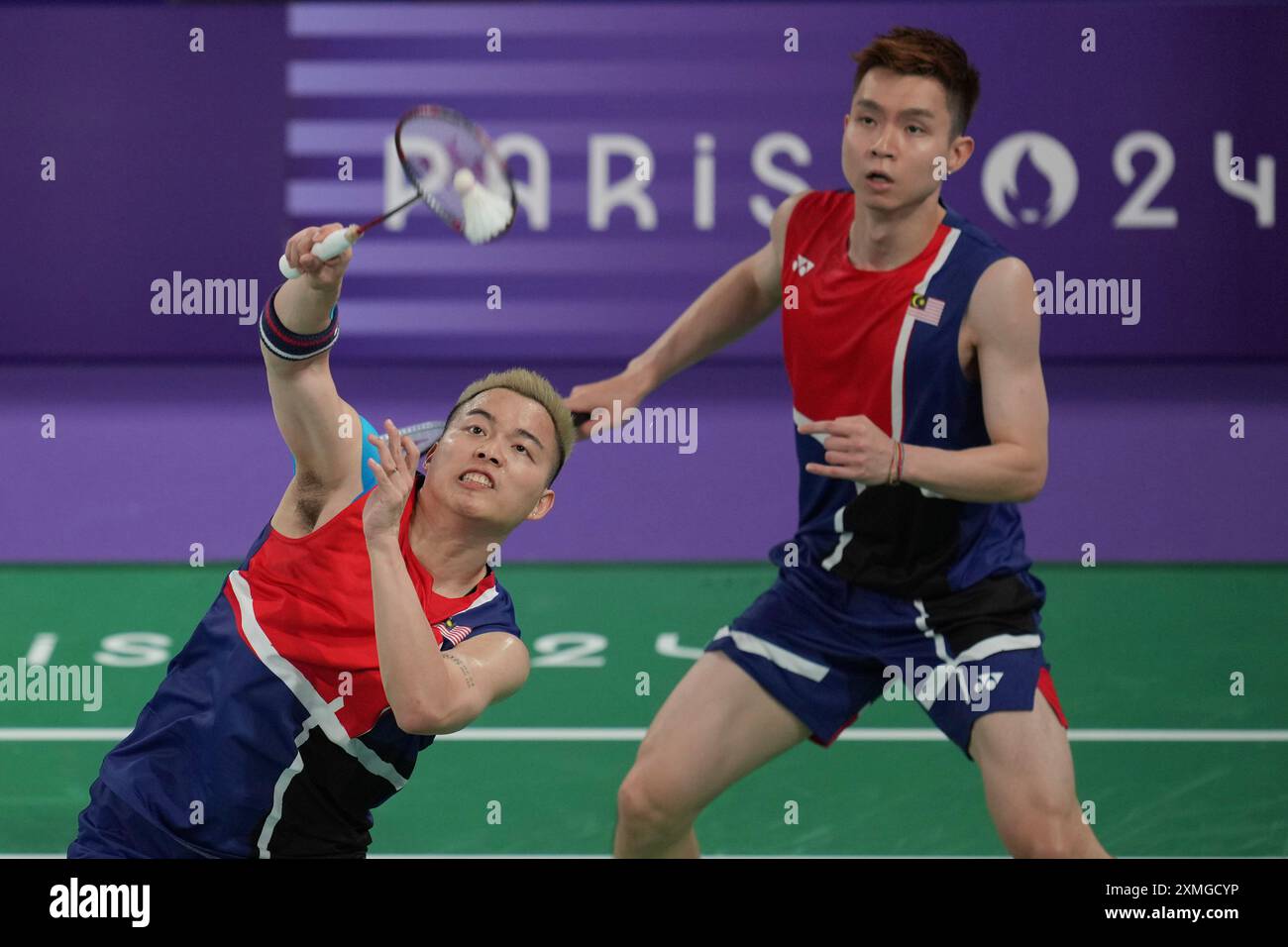 Malaysia's Aaron Chia, left, and Soh Wooi Yik play against Canada's ...