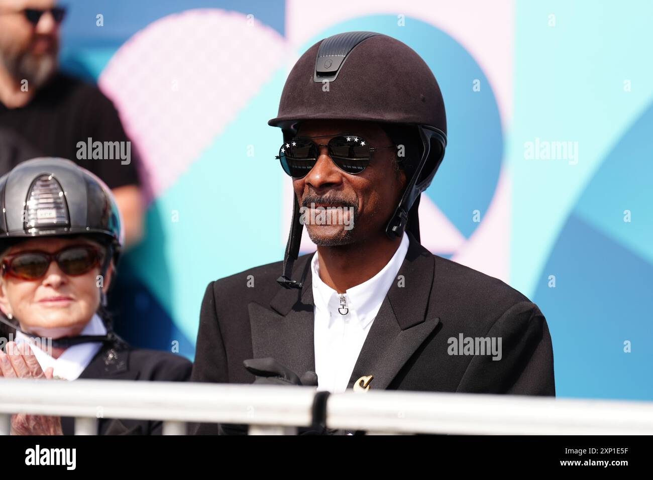 Snoop Dogg regardant le spécial du Grand Prix par équipe de dressage au ...
