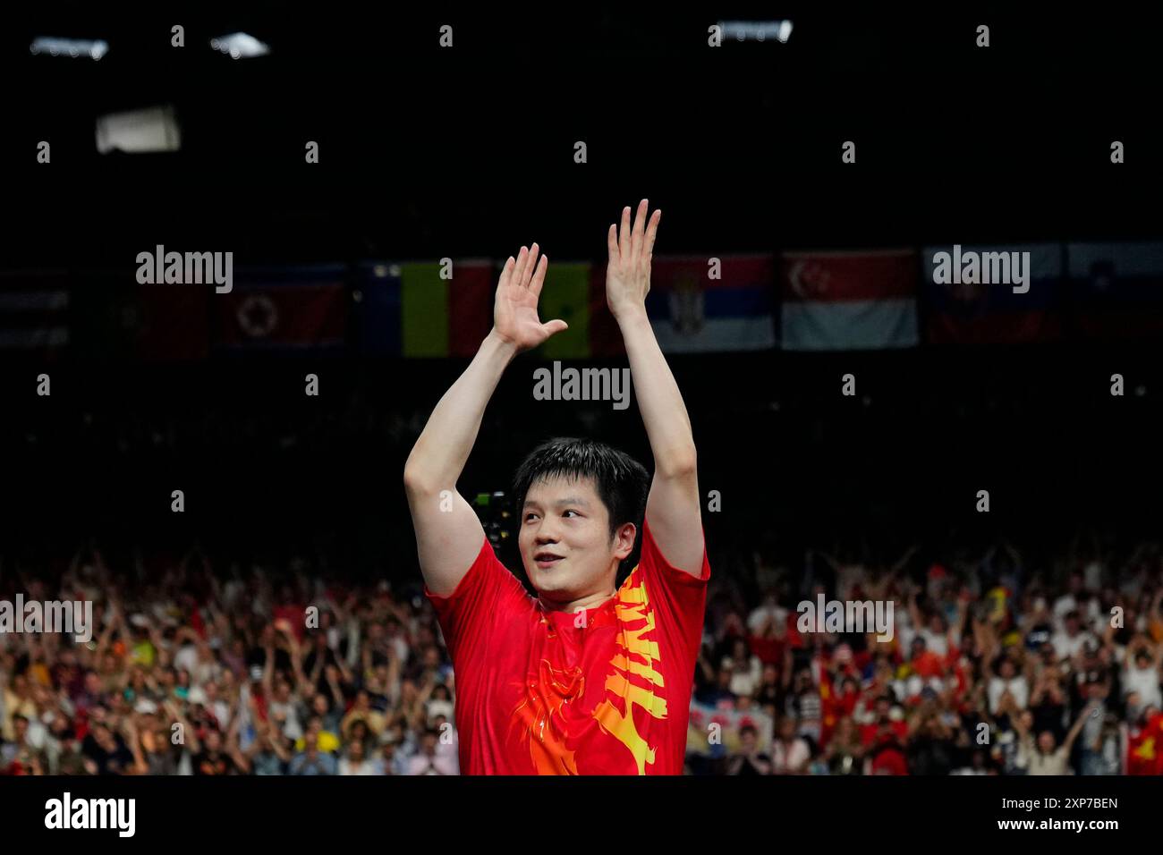 China's Fan Zhendong celebrates after defeating Sweden's Truls Moregard ...