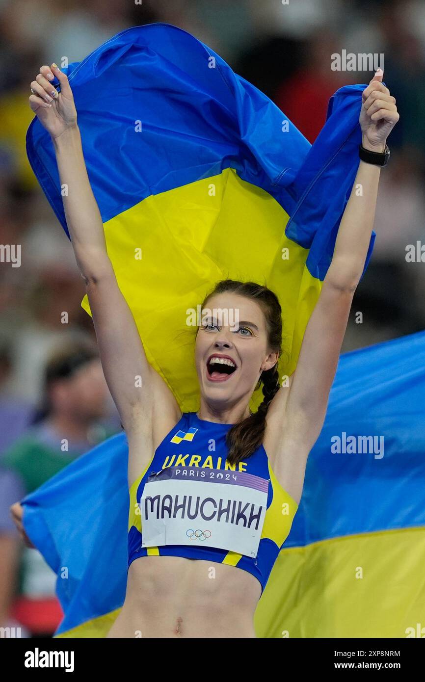 Yaroslava Mahuchikh, of Ukraine, celebrates winning the gold medal in ...