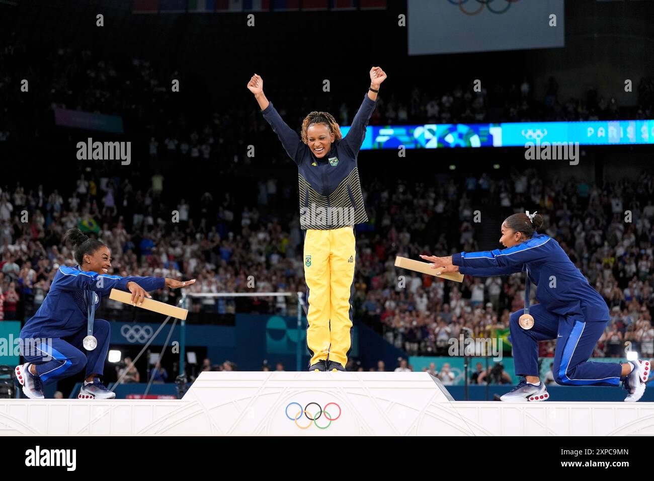 Silver medalist Simone Biles, of the United States, left, and bronze ...