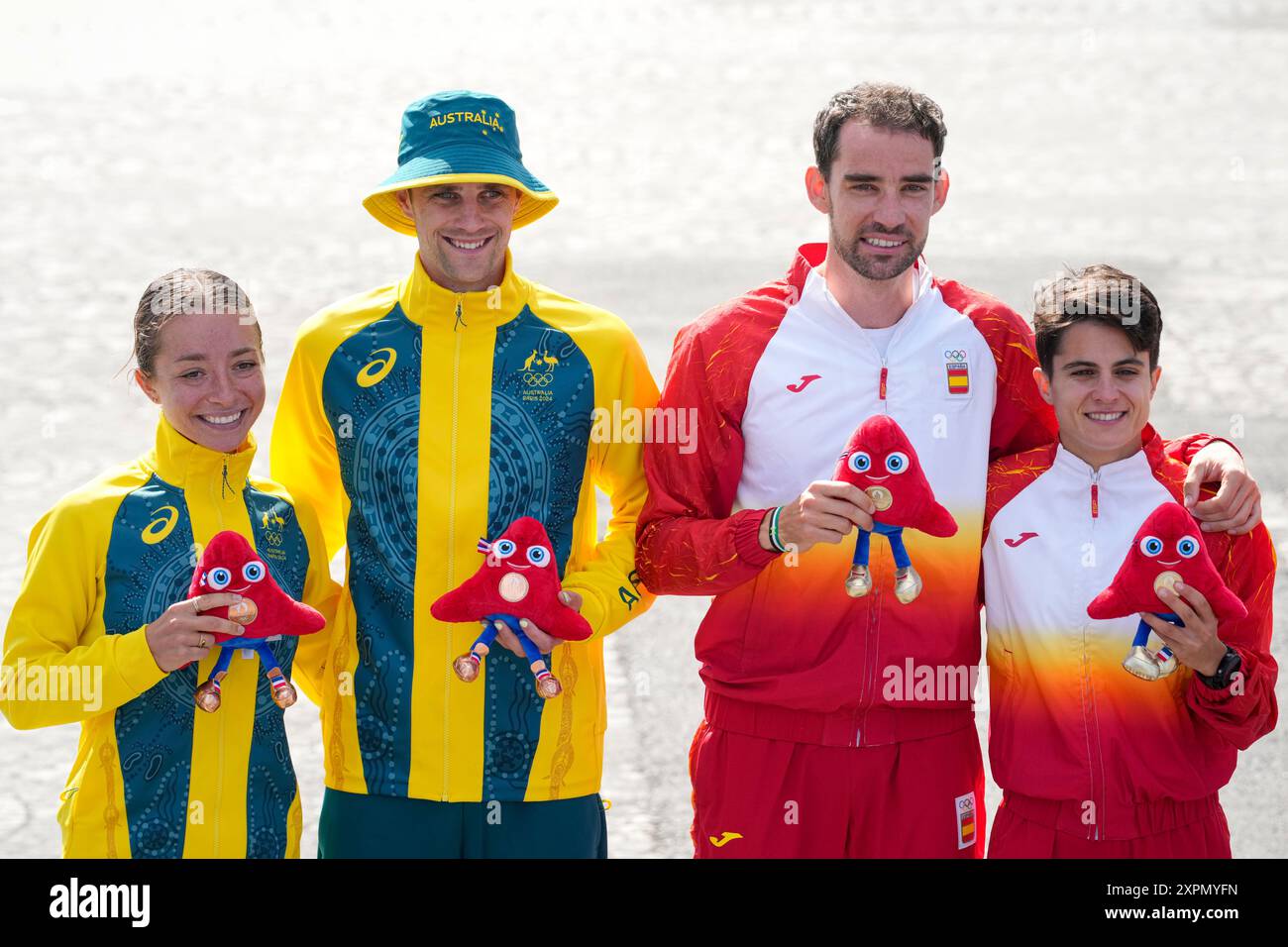 Gold medalists Spain's Alvaro Martin and Maria Perez, right, and bronze ...