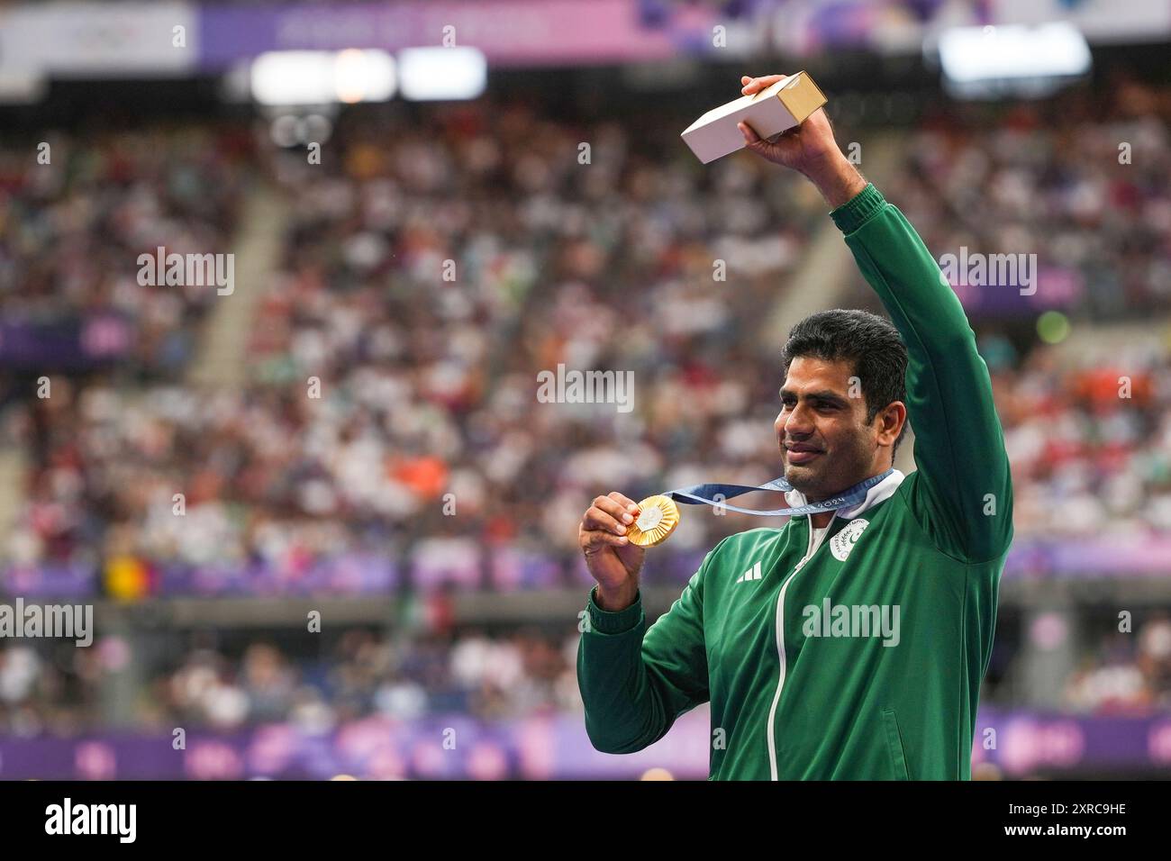 Gold medallist Arshad Nadeem of Pakistan celebrates on the podium ...