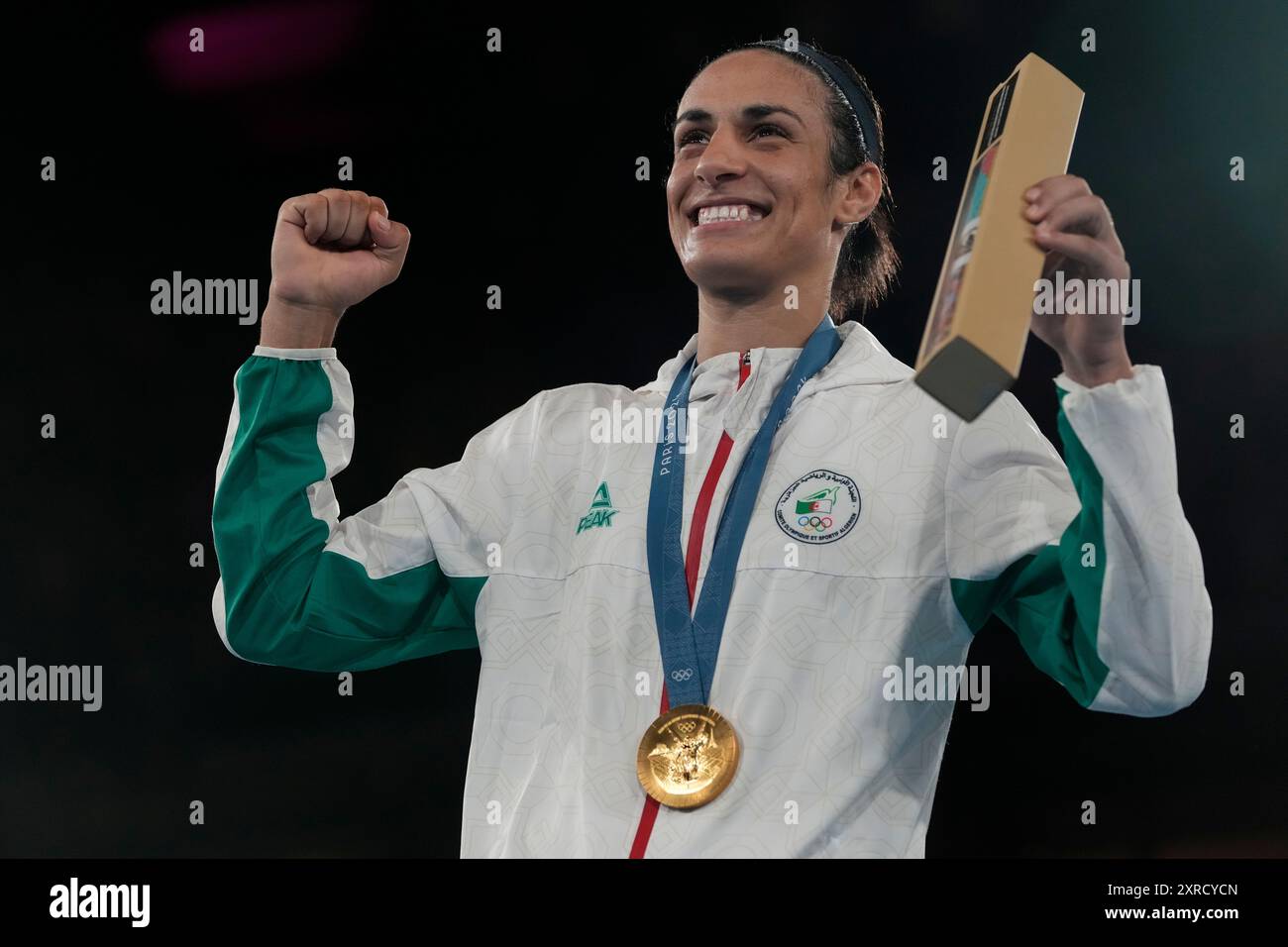 Gold medalist Algeria's Imane Khelif poses during a medals ceremony for the women's 66 kg final ...