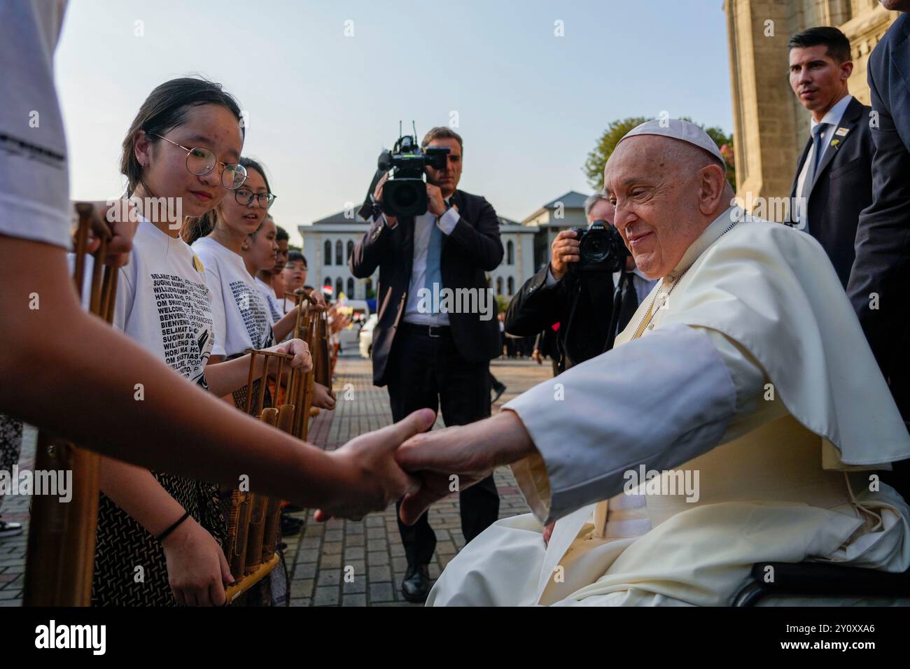 Pope Francis is greeted by faithful as he arrives at the Cathedral of ...
