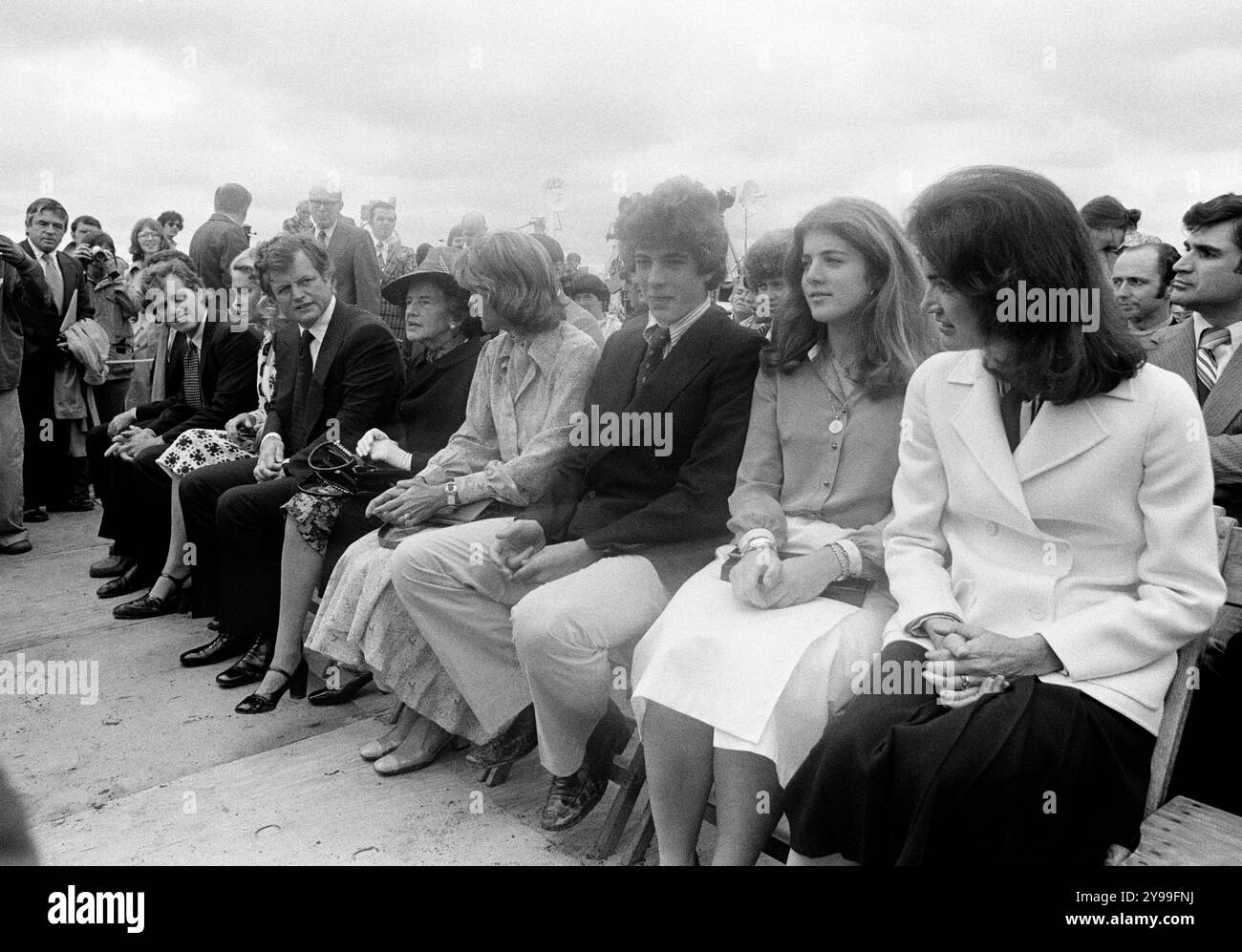 Members of the Kennedy family sit in a row, June 12, 1977 in Boston for ...