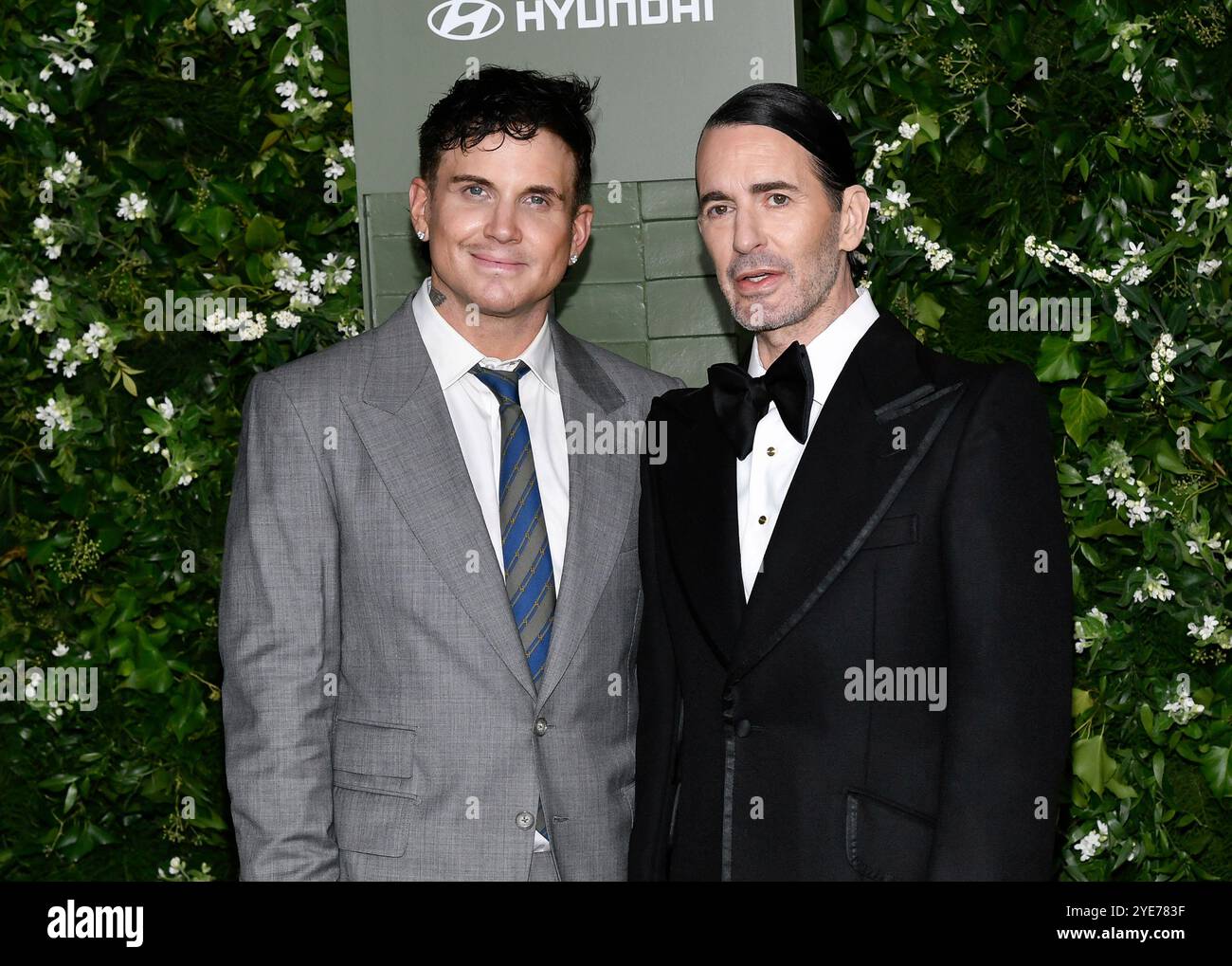 Honoree Marc Jacobs, right, and husband Char Defrancesco attend the WSJ ...