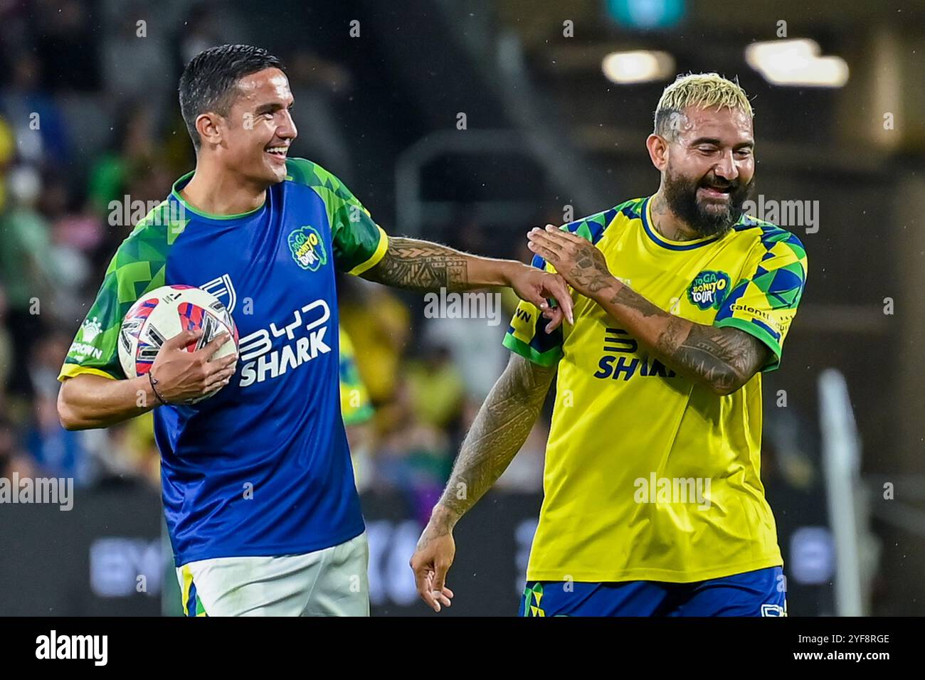Tim Cahill du XI de Cahill et son frère Chris Cahill du XI de ...