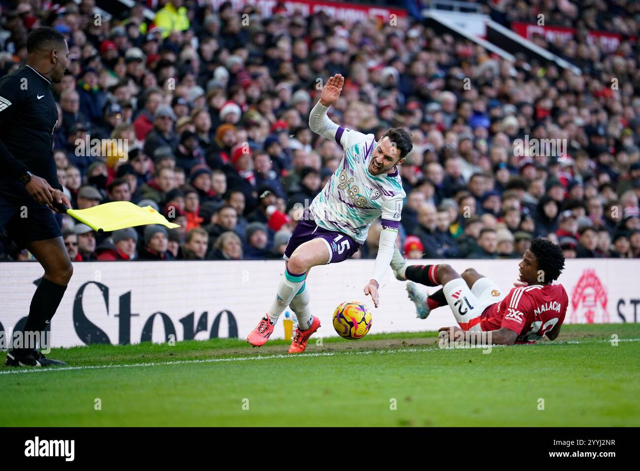 Line referee Akil Howson watches as Manchester United's Tyrell Malacia ...
