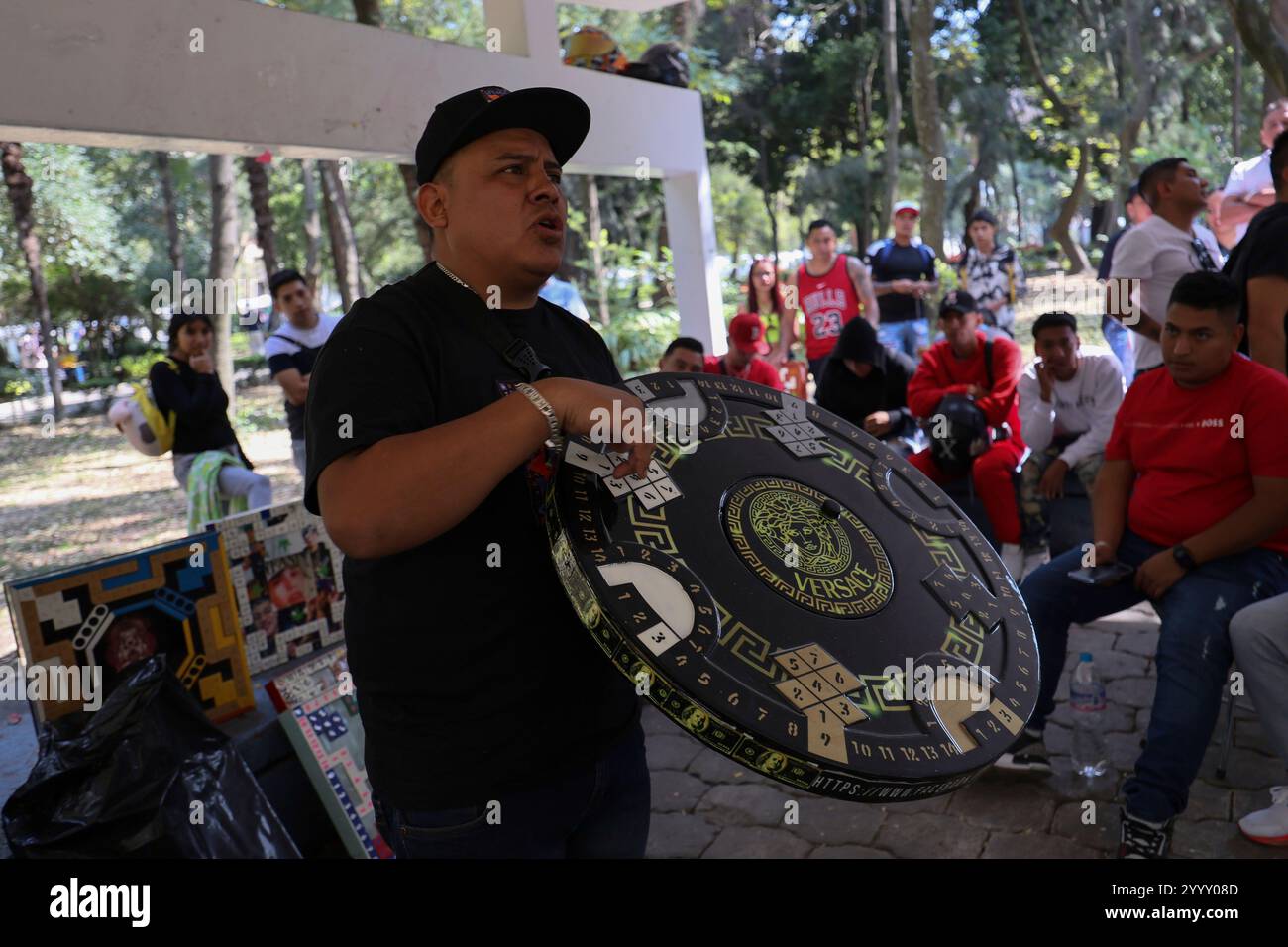 Jonathan Rulleri, the founder of Poleanas Canada Frogs, holds up a ...