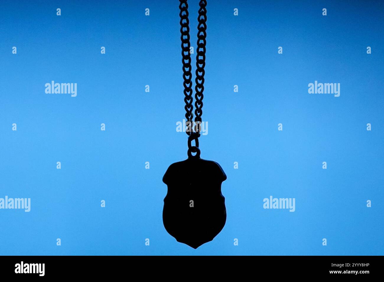 A chain depicting St. Michael, the patron saint of law enforcement ...