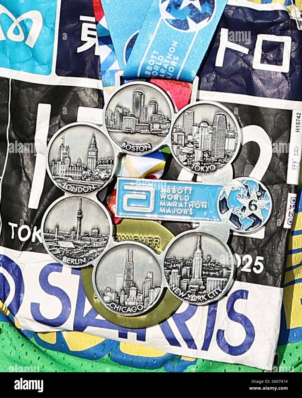 A photo shows the Six Star Finisher medal, awarded to runners who ...