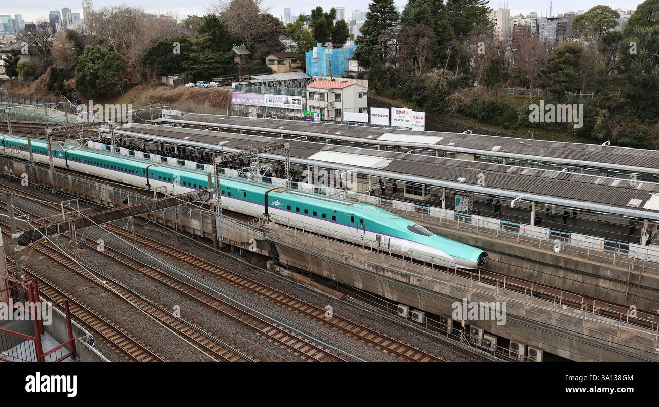A photo shows "Hayabusa" of the Tohoku Shinkansen (bullet train) moving with its coupling ...