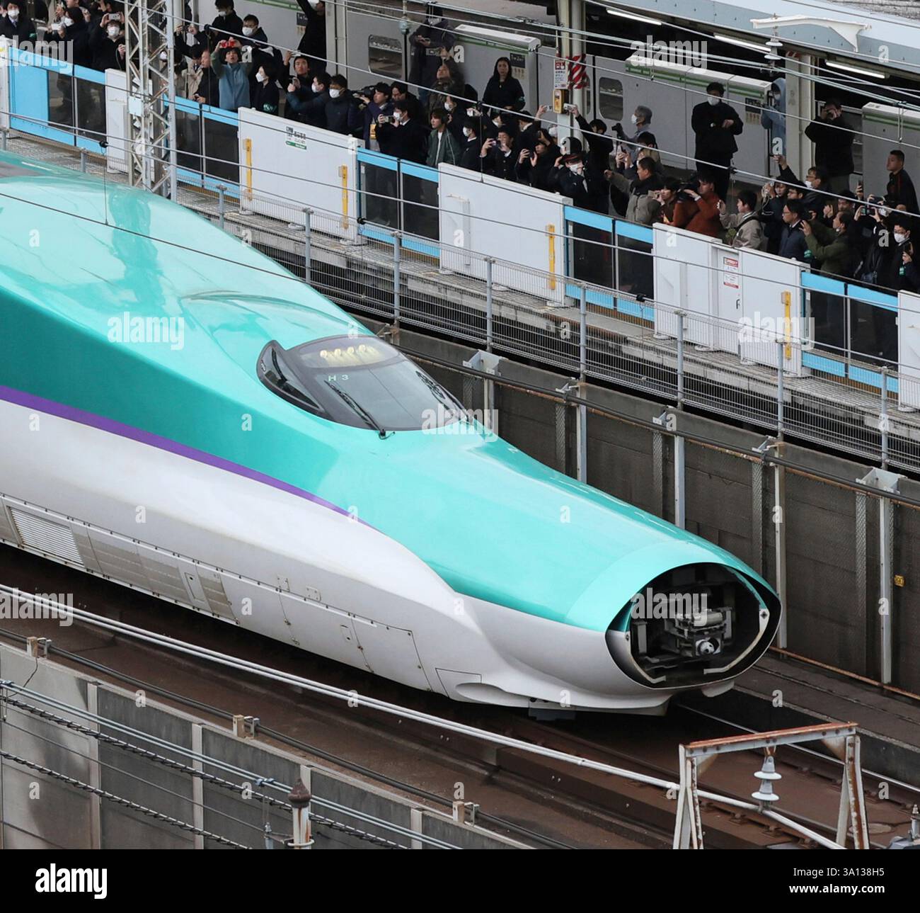 A photo shows "Hayabusa" of the Tohoku Shinkansen (bullet train) moving with its coupling ...