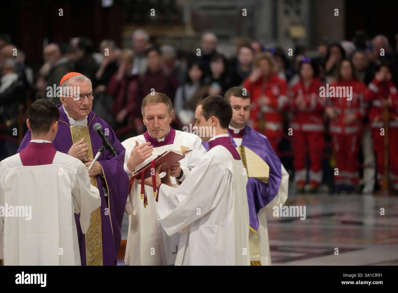 Vatican Secretary of State, Cardinal Pietro Parolin, left, delegated by ...