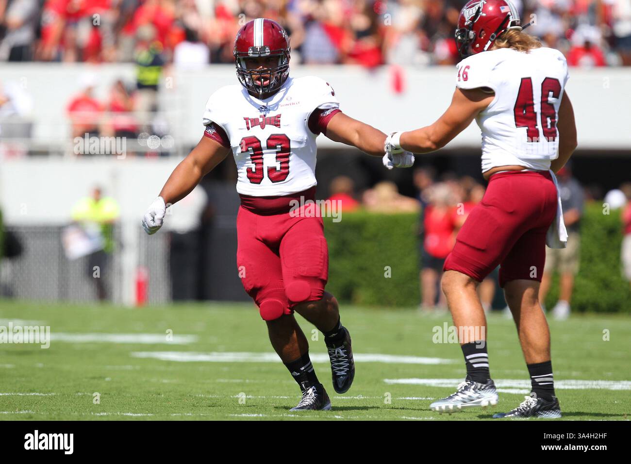 20 septembre 2014 : Josh Anderson (33) et Nick McLaughlin (46) de Troy ...