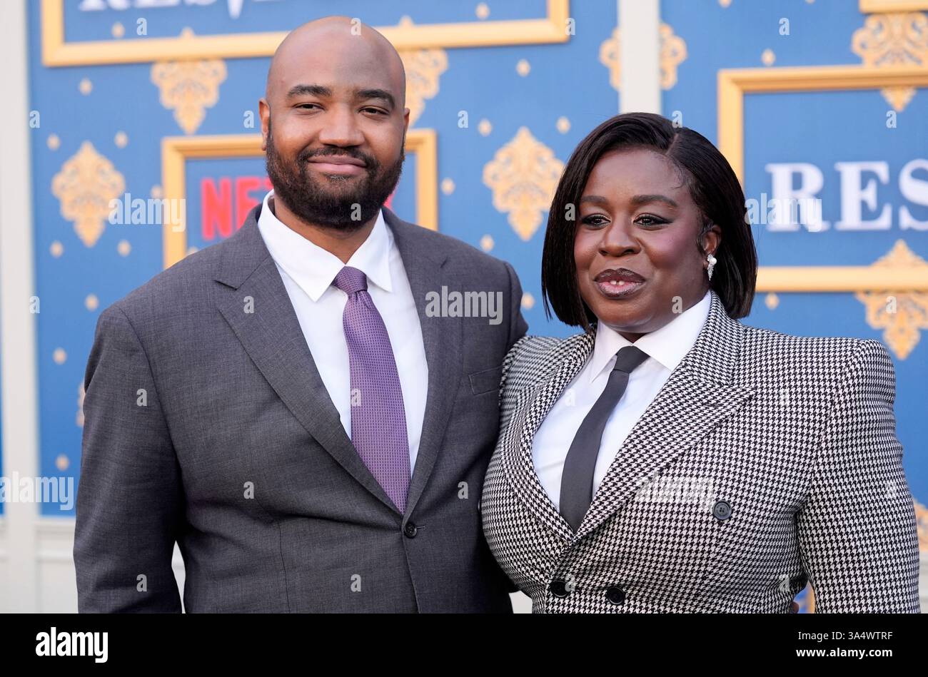 Uzo Aduba and her husband Robert Sweeting pose together at the premiere ...