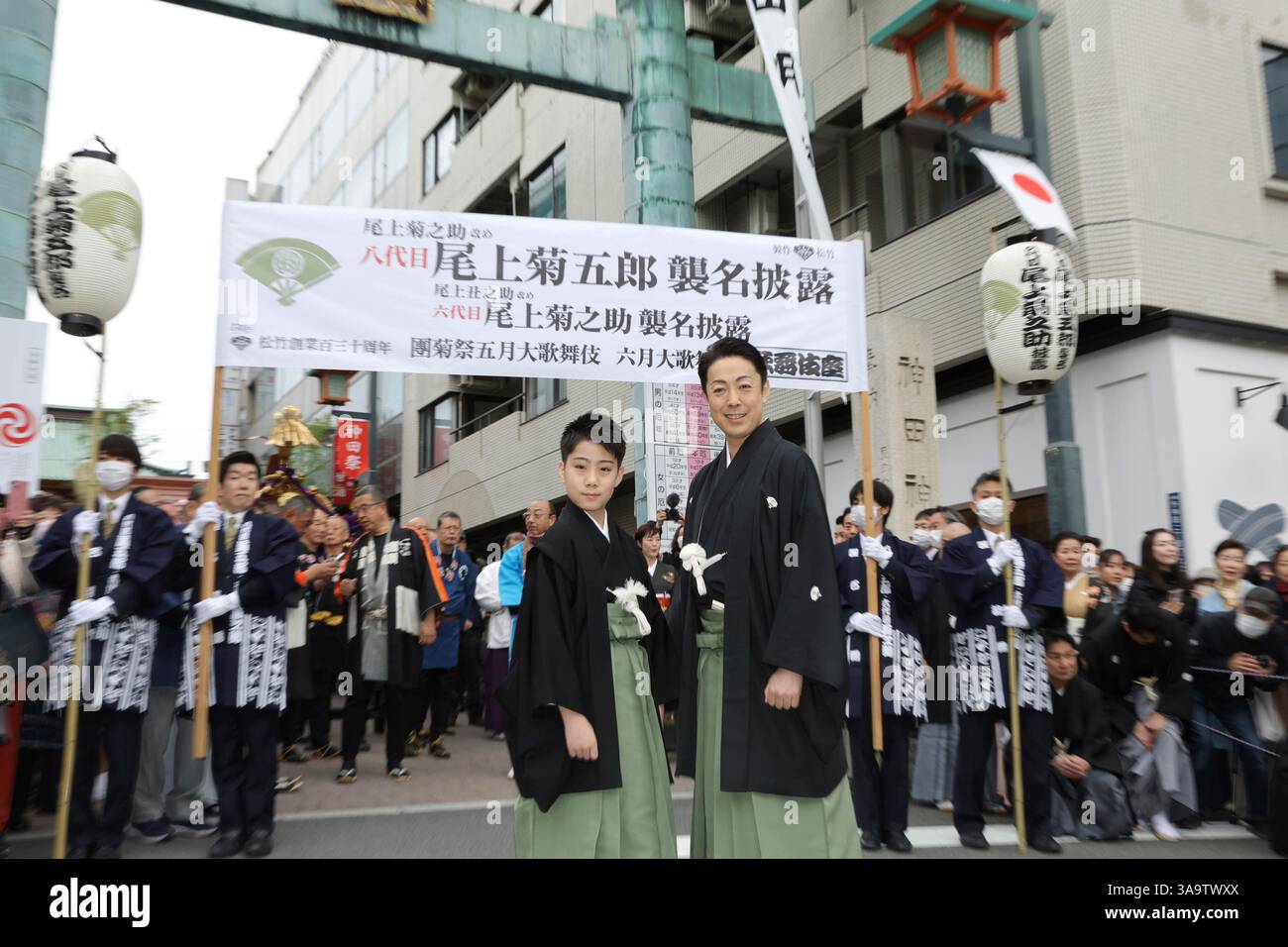 Kabuki actor Onoue Kikunosuke (R) and his eldest son Onoe Ushinosuke ...