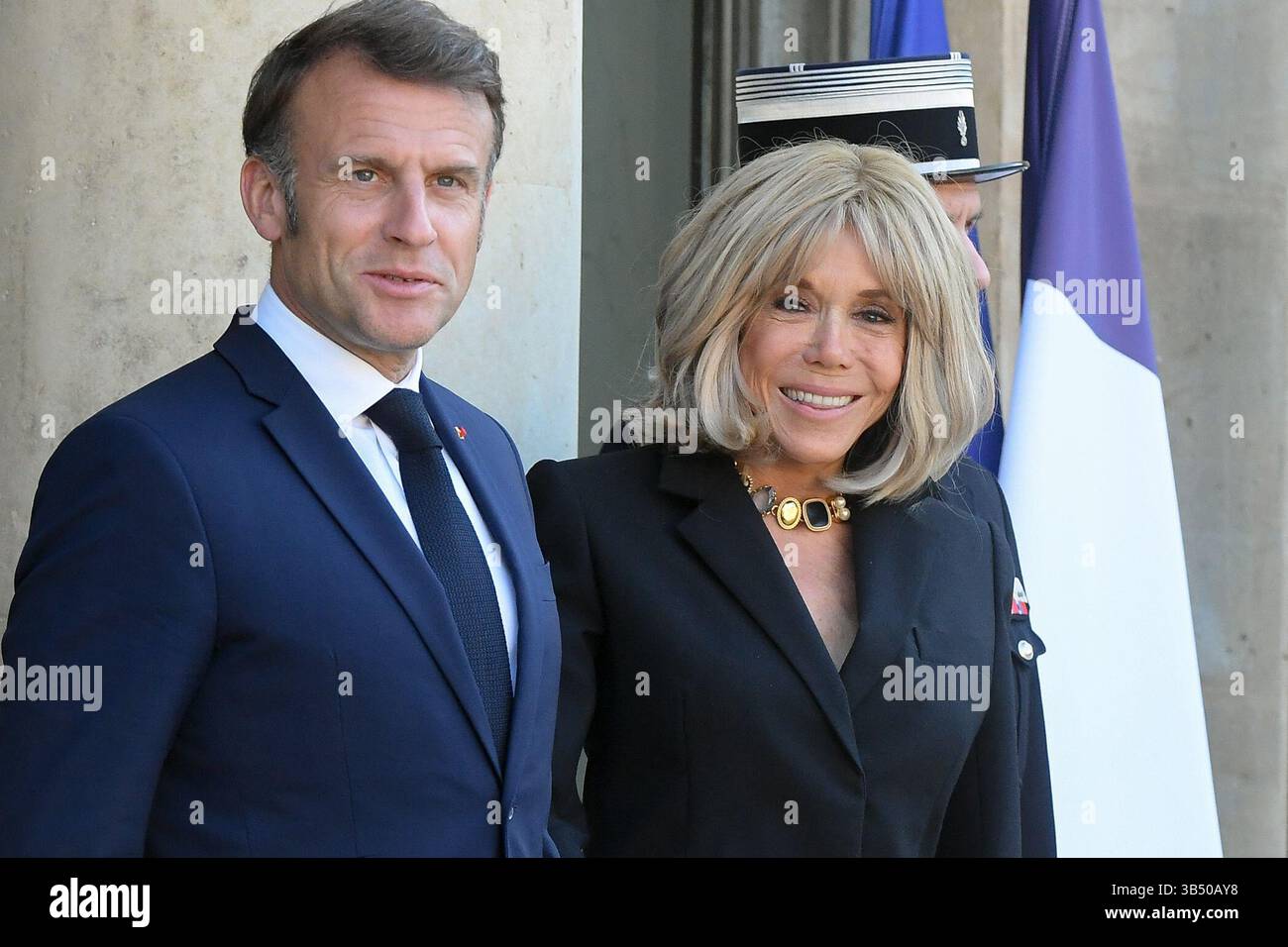 Le président de la République Emmanuel Macron et MM. Brigitte Macron ...