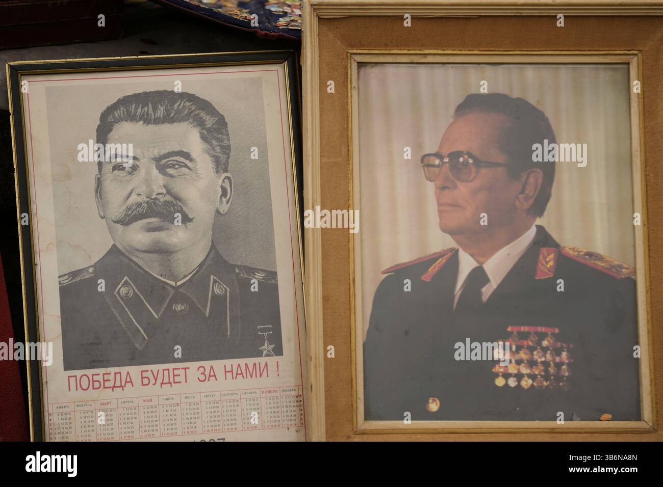 A street vendor sells images of former Soviet leader Joseph Stalin ...
