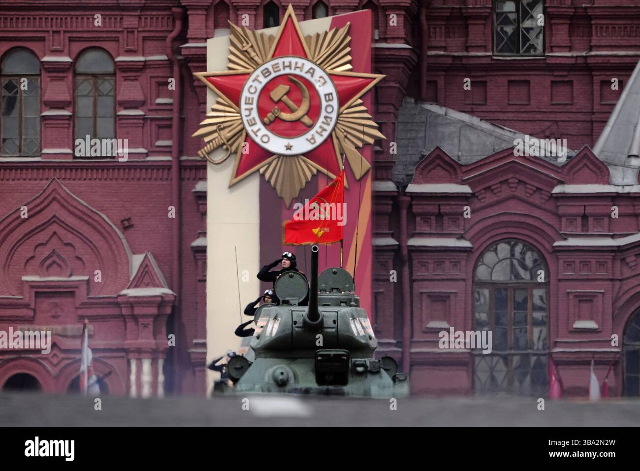 Legendary Soviet era T-34 tanks roll in Red Square with the a model of ...