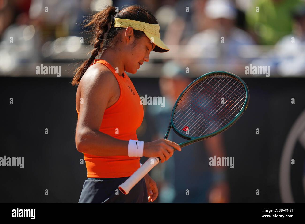 Britain's Emma Raducanu looks down as she plays United States' Coco ...