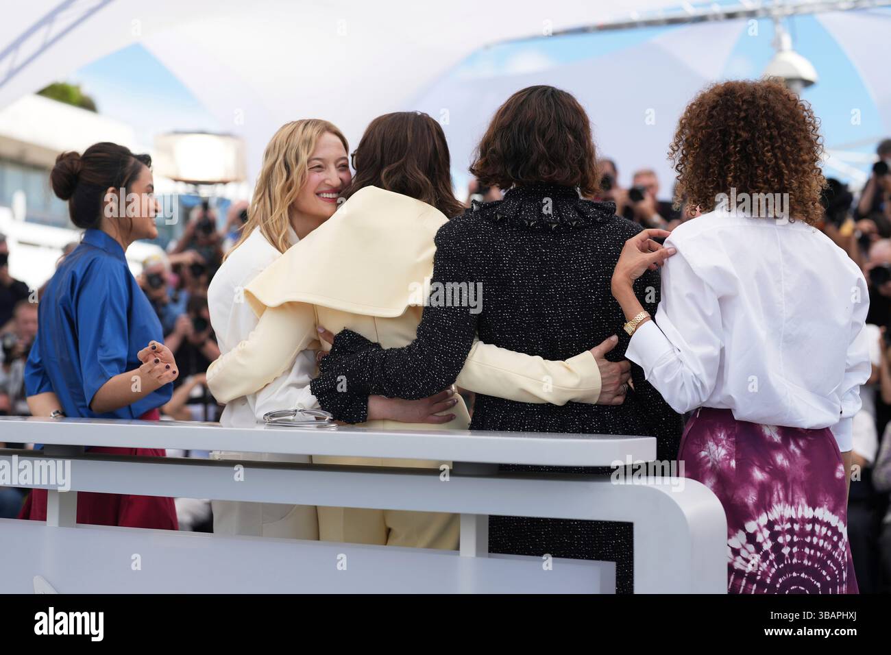 Jury president Juliette Binoche, centre, and jury members Payal Kapadia ...