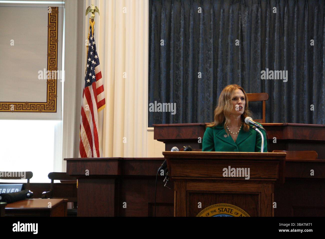 Allison Riggs speaks to audience members at her swearing-in ceremony in ...