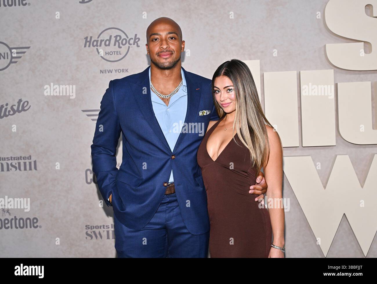 NFL player AJ Dillon, left, and wife Gabrielle Dillon attend the Sports Illustrated Swimsuit ...