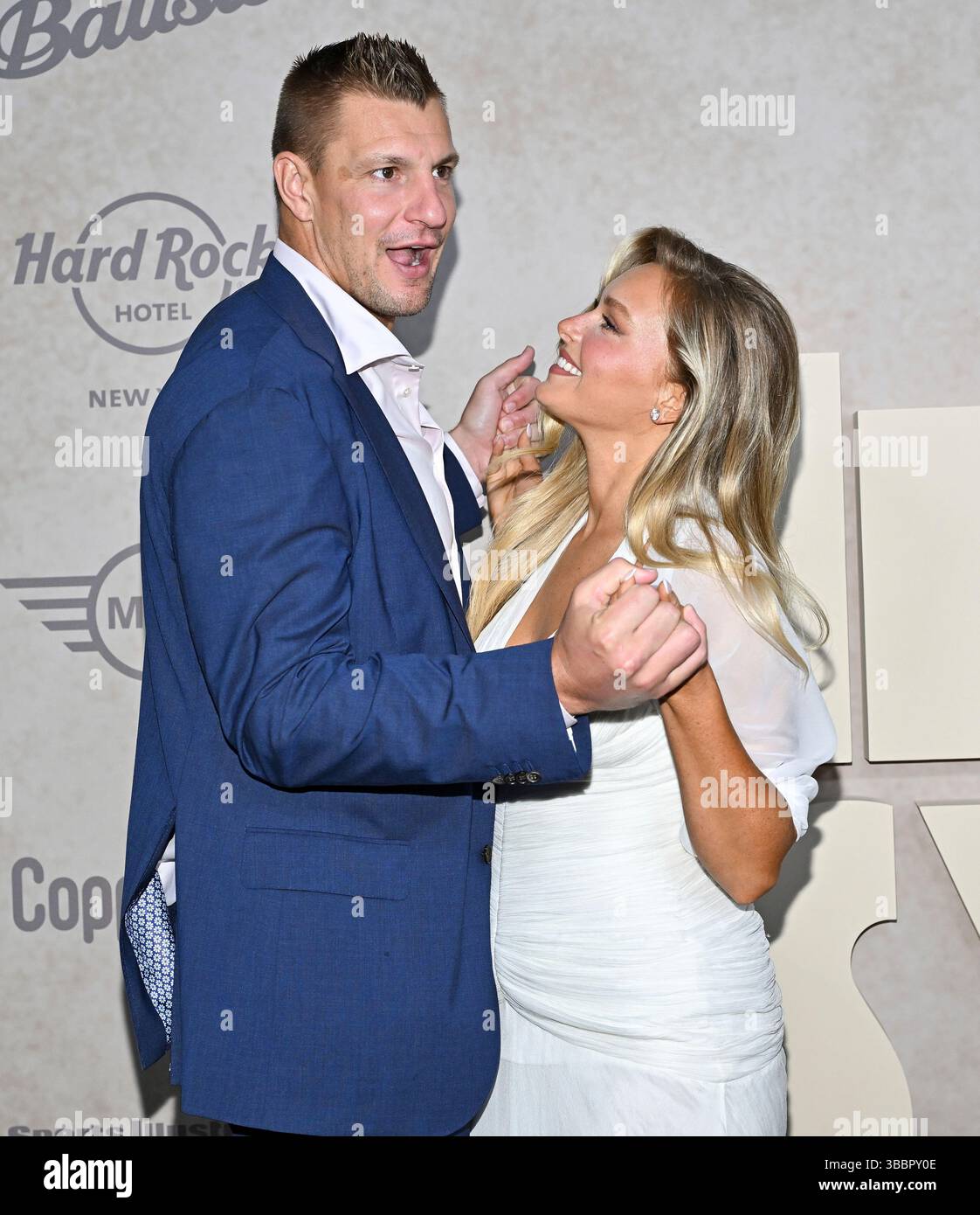 Rob Gronkowski, left, and Camille Kostek attend the Sports Illustrated Swimsuit Edition launch ...
