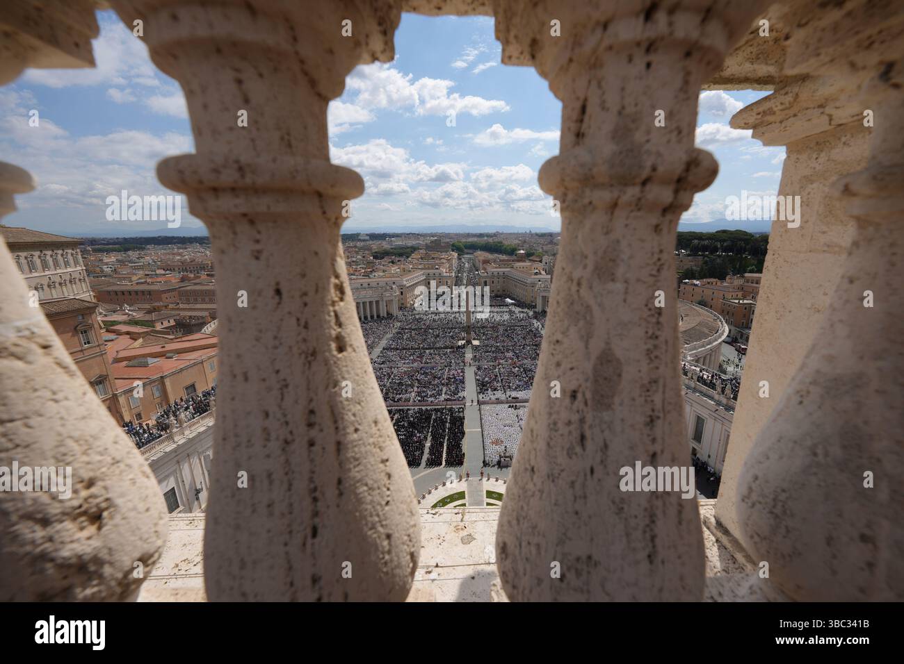 People gather as Pope Leo XIV celebrates a Mass for the formal ...