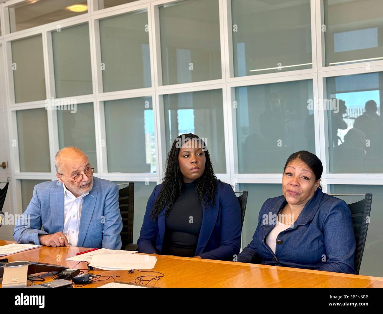 Attorneys Billy Murphy, left, and Janai Woodhouse look on as Collette ...