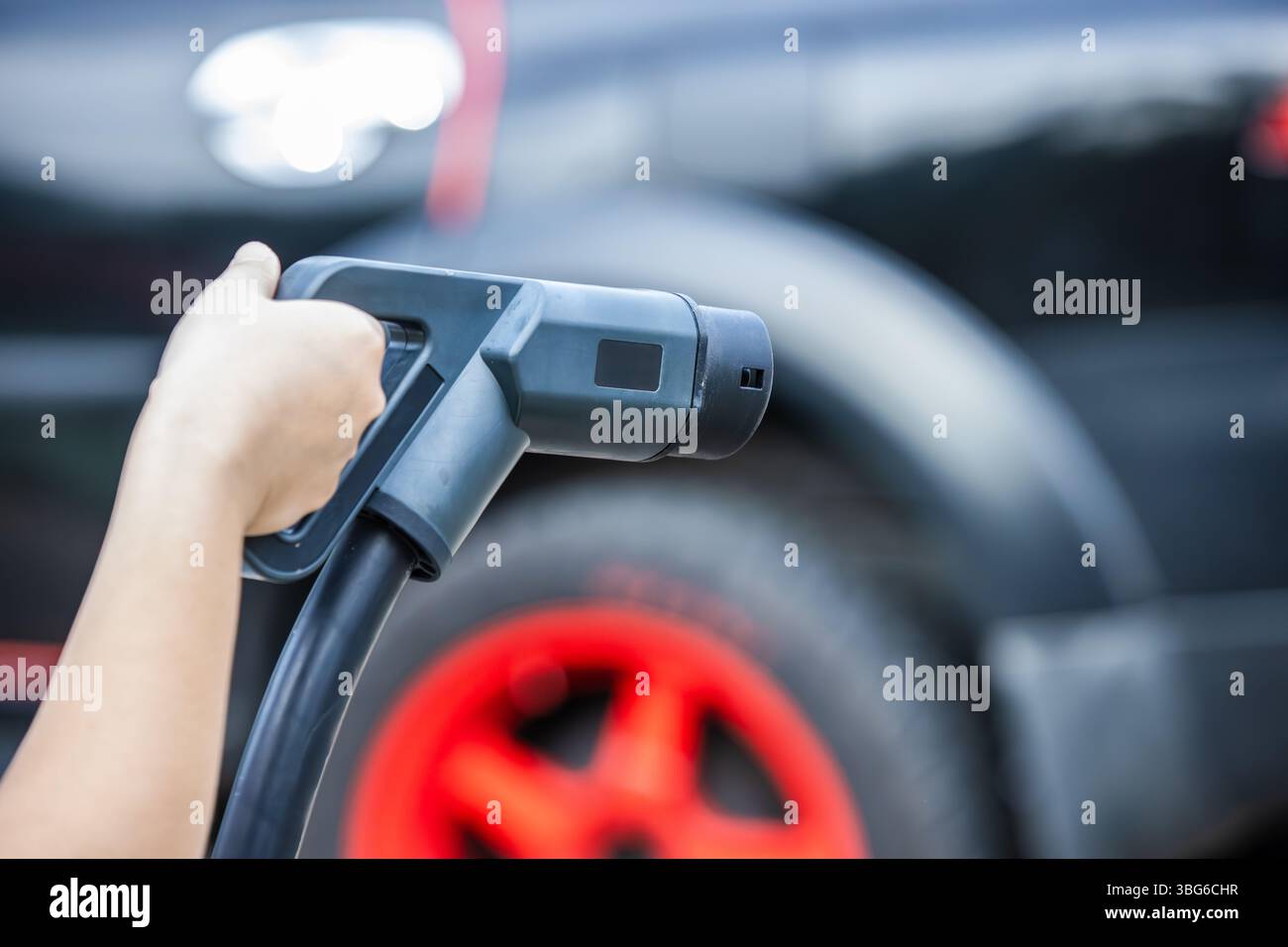 Chargeur ev main Banque de photographies et d’images à haute résolution ...