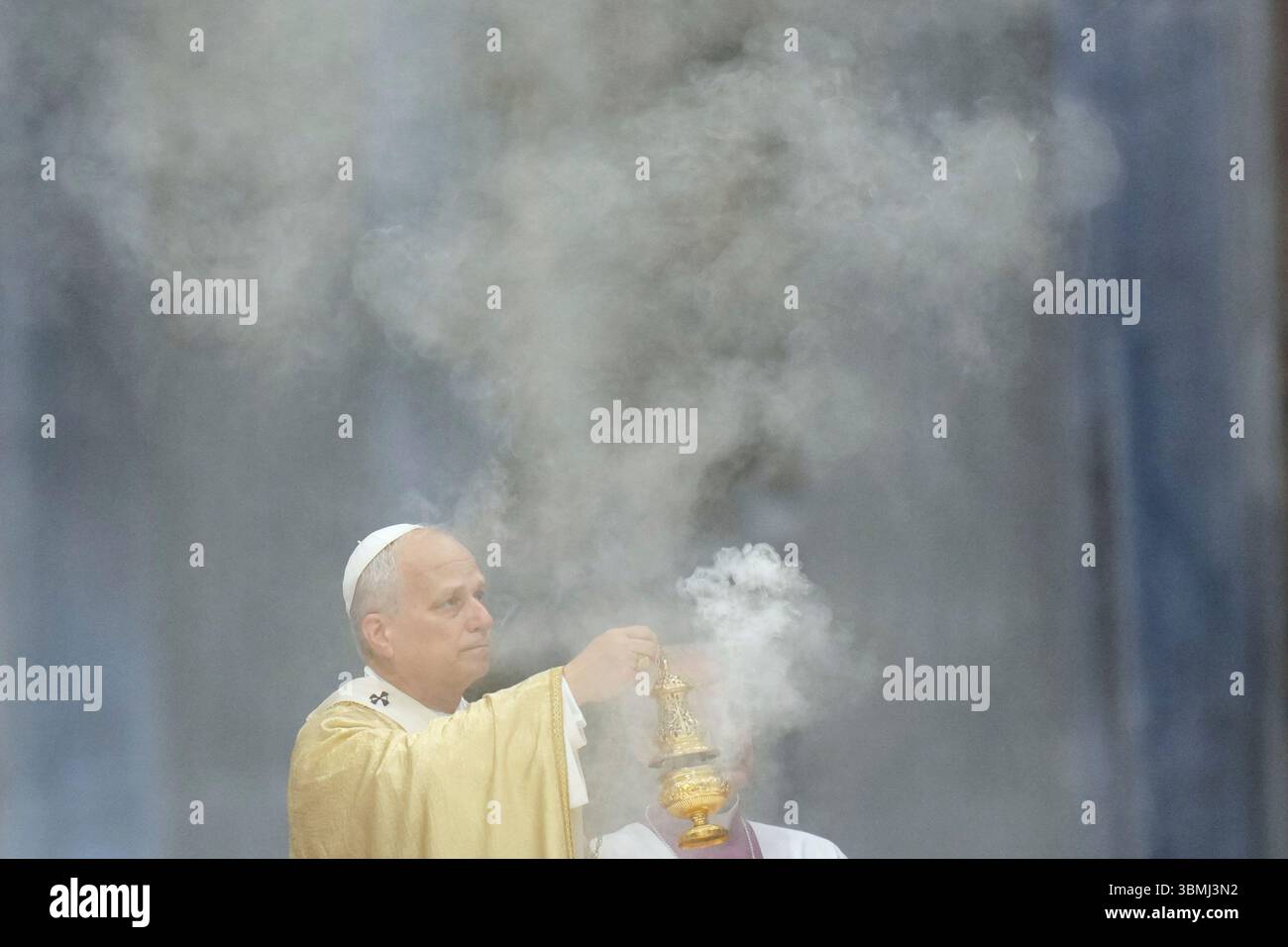 Pope Leo XIV spreads incense during an ordination Mass in St. Peter's ...