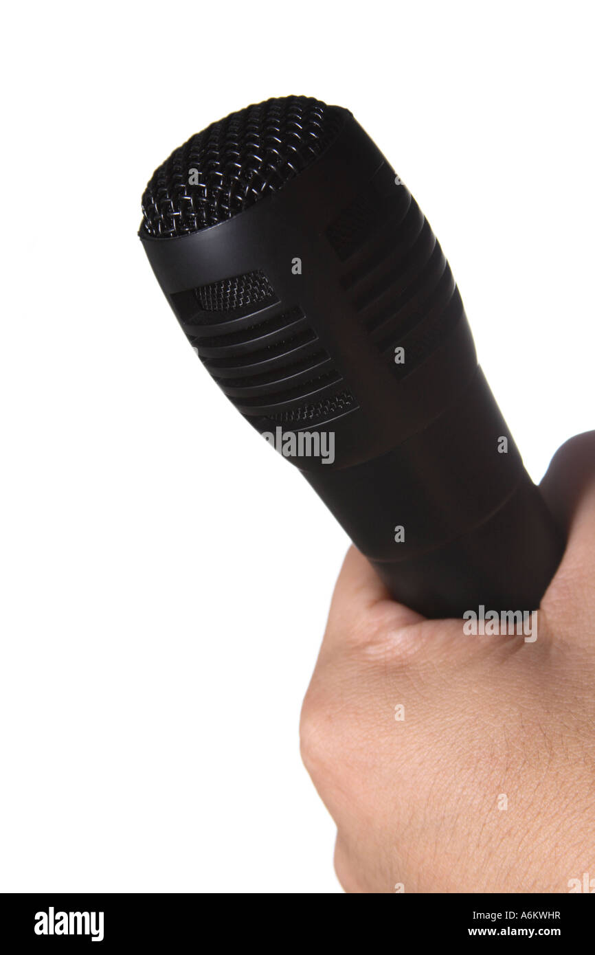Une main noire qui tient un micro Banque de photographies et d’images à ...