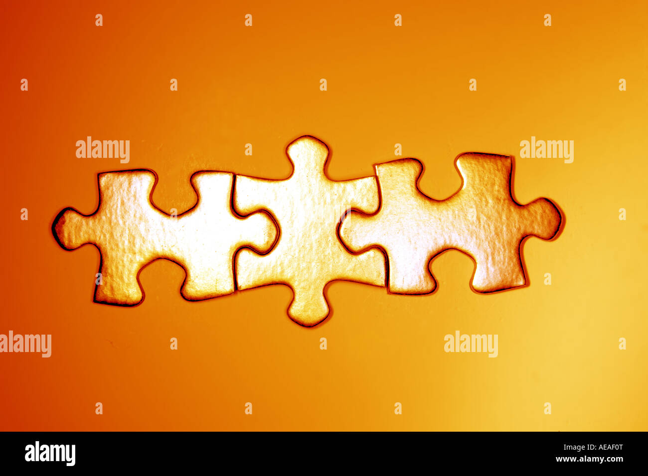 Three puzzle pieces fit together Banque de photographies et d’images à ...