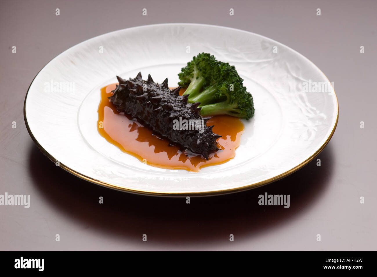 Braised sea cucumber in abalone sauce Banque de photographies et d ...