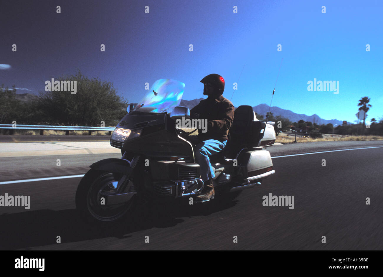 Honda goldwing man riding Banque de photographies et d’images à haute ...