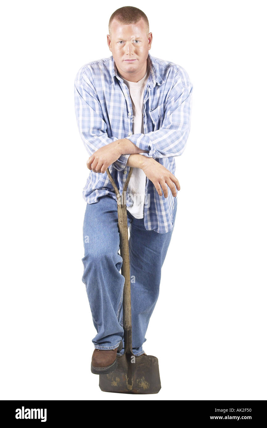 Man leaning on shovel Banque de photographies et d’images à haute ...
