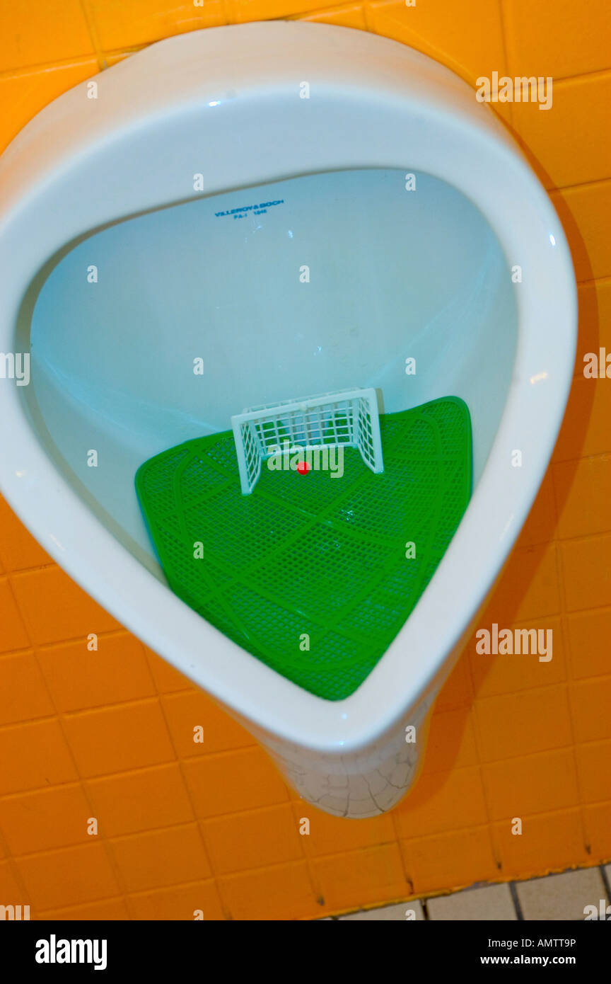 Urinal with soccer goal and football Banque de photographies et d ...
