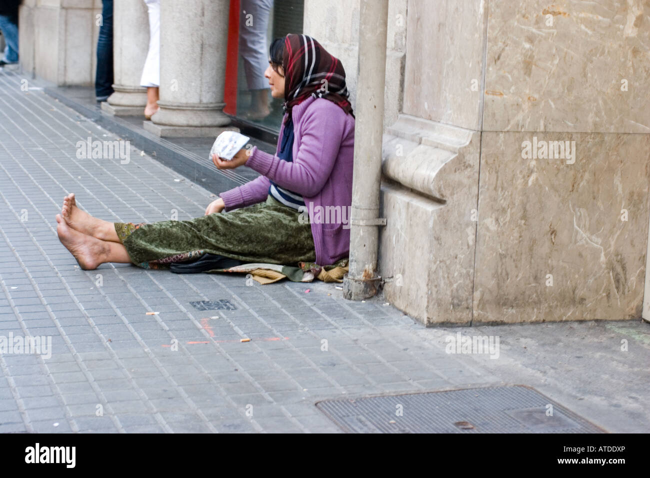 Femme mendiante Banque de photographies et d’images à haute résolution ...