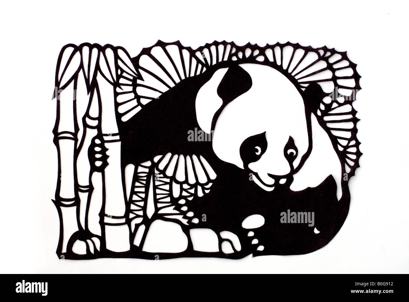 Panda et bambou papercut faites en utilisant des ciseaux pour découper ...