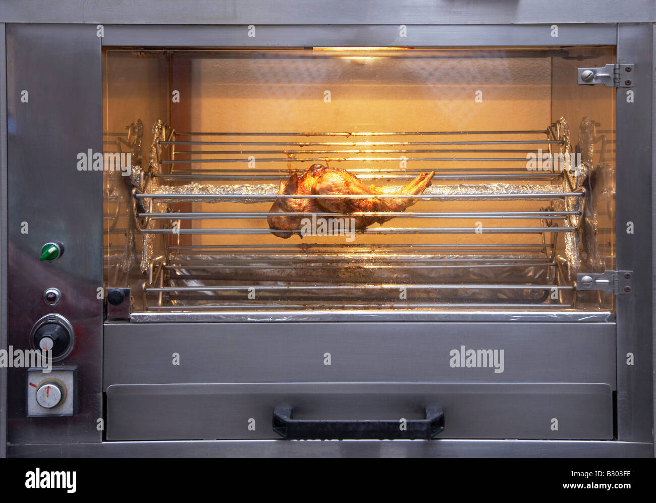 Rotisserie chicken cooking spit Banque de photographies et d’images à ...