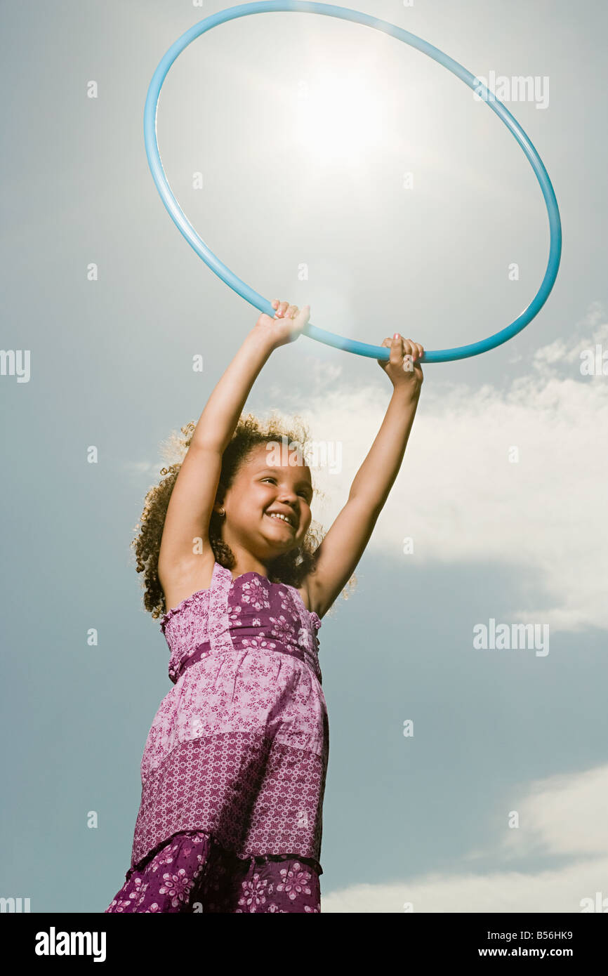 Fille avec un cerceau Banque de photographies et d’images à haute ...