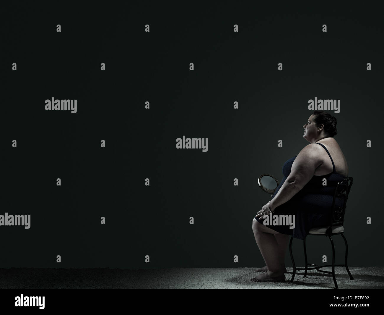 Fat woman sitting in chair Banque de photographies et d’images à haute ...