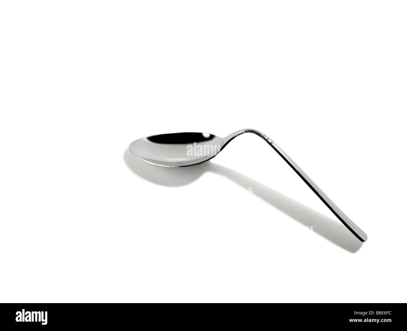 Spoon bent silver Banque de photographies et d’images à haute ...