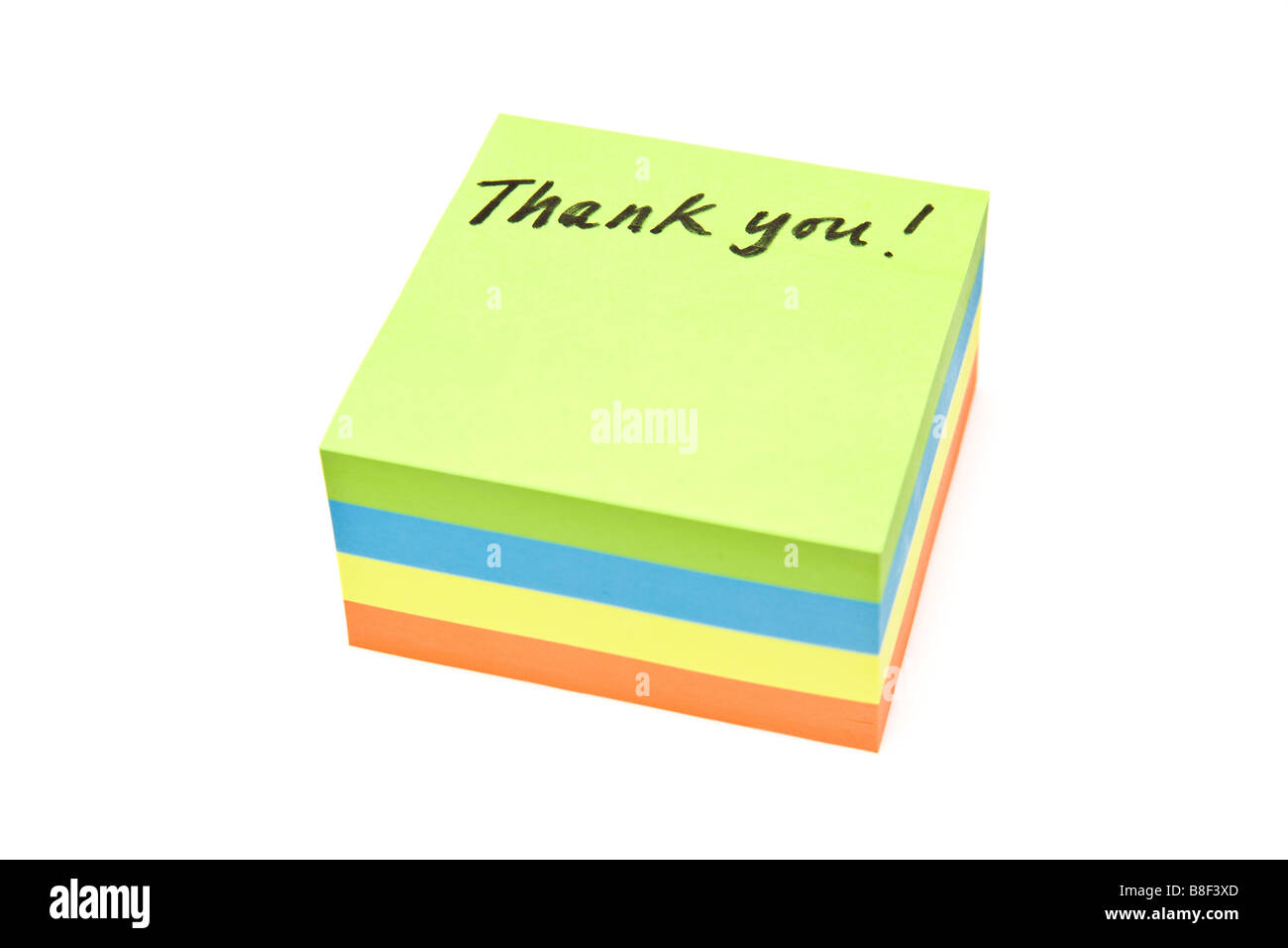Merci écrit sur une pile de post it isolated on a white background ...