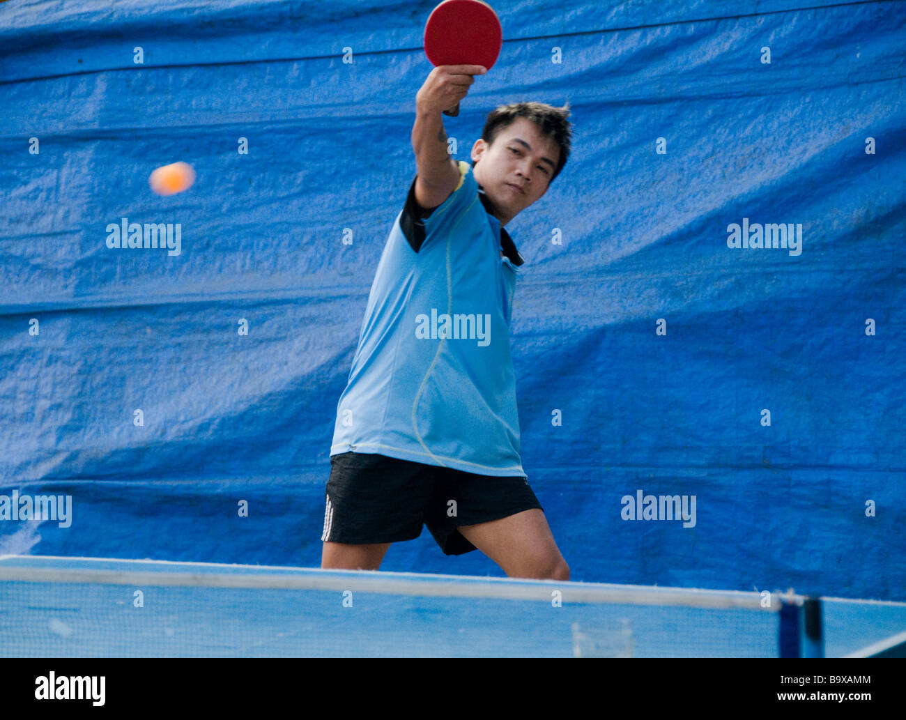 Ping pong player in action Banque de photographies et d’images à haute ...