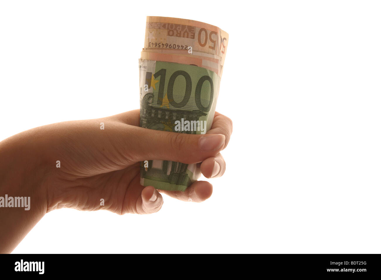 Hand holding wad euro banknotes Banque de photographies et d’images à ...