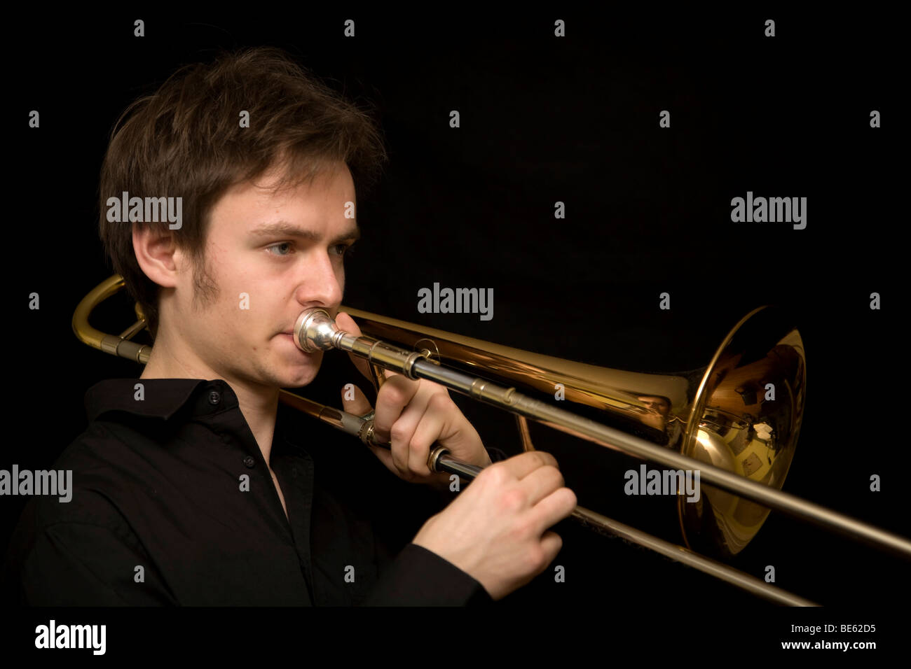 Musicien jouant du trombone Banque de photographies et d’images à haute ...